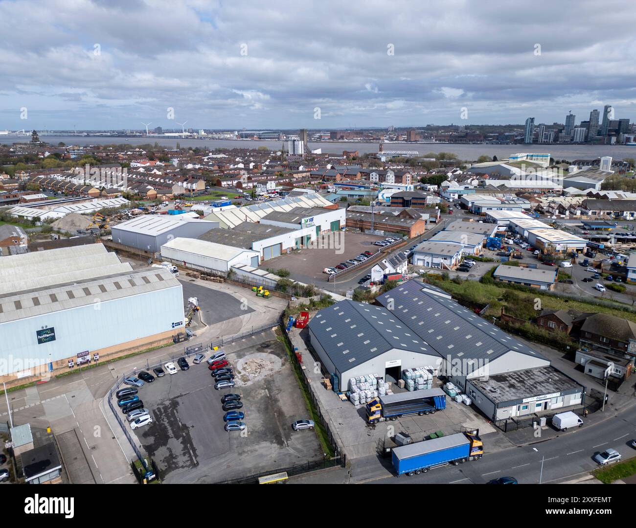 Aerial view of an industrial estate at Birkenhead Docks with River ...