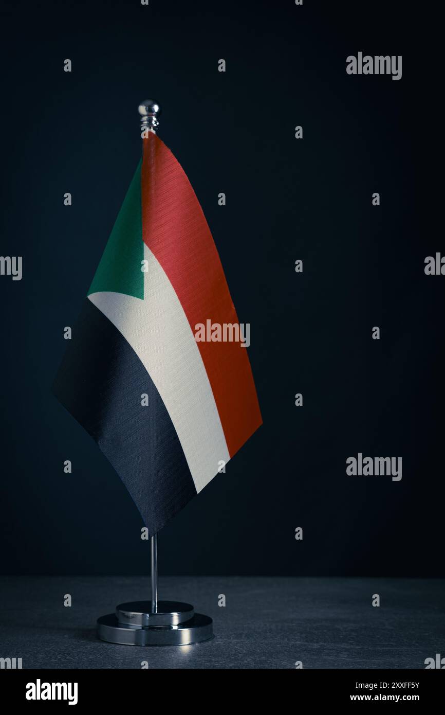 Table flag of Sudan on dark background Stock Photo - Alamy