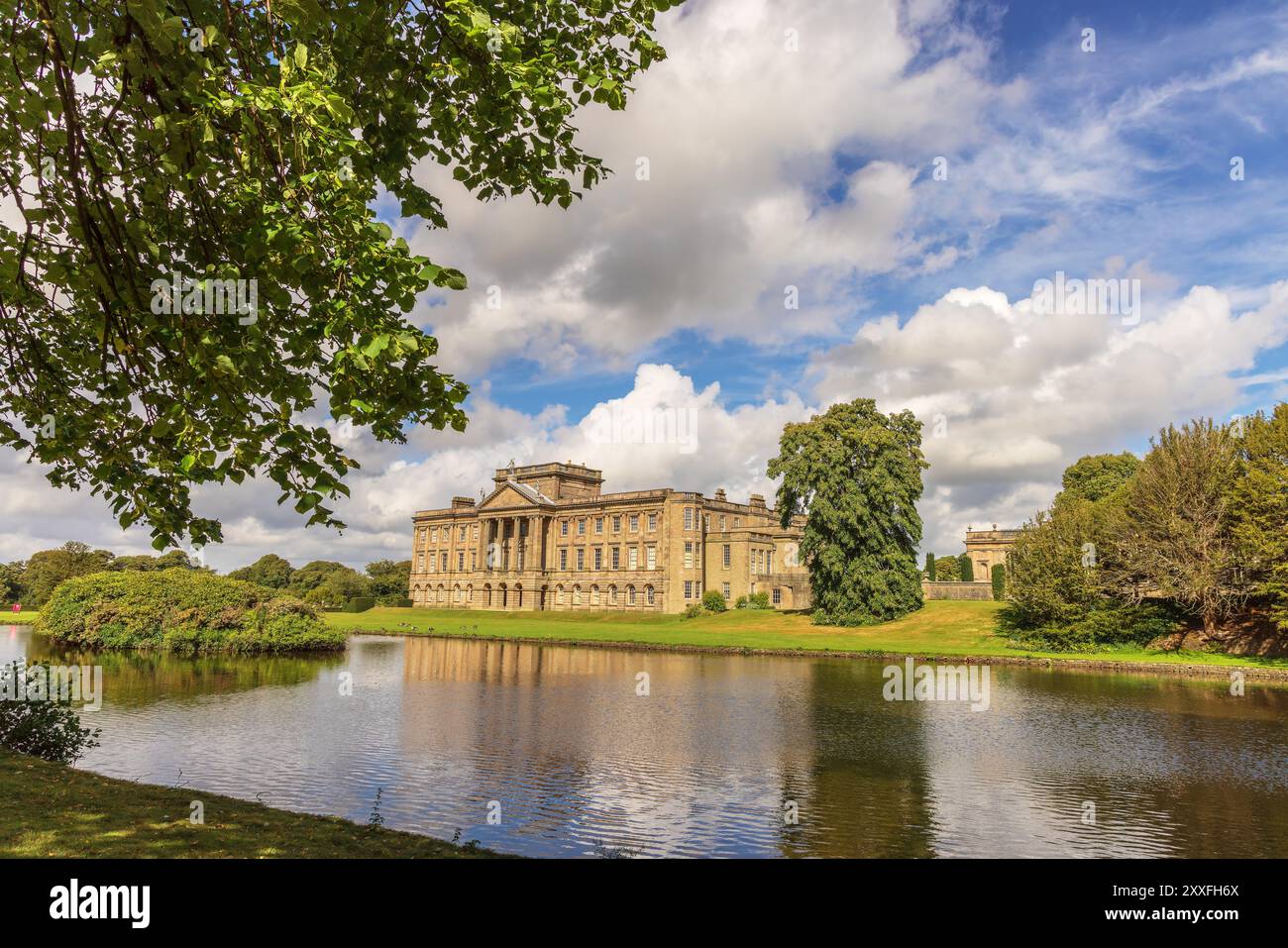 Lyme Hall mansion house surrounded by formal gardens and a deer park in ...