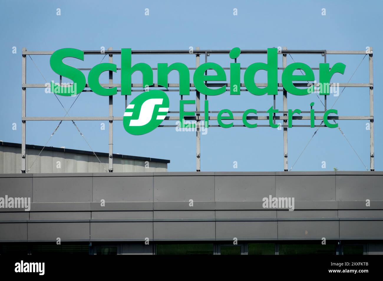 Sign Schneider electric logo on building Stock Photo - Alamy
