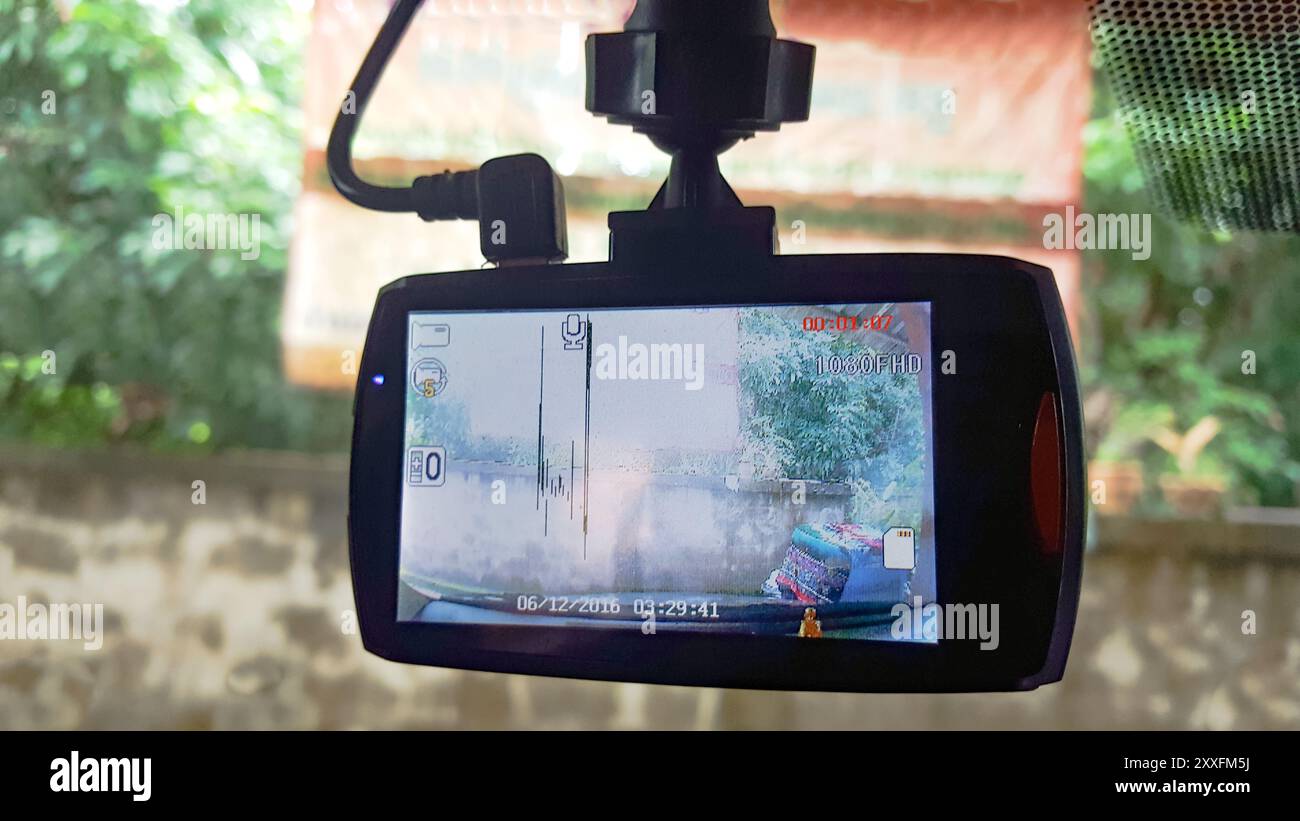 Malfunctioning car CCTV monitor displaying distorted lines, indicating ...