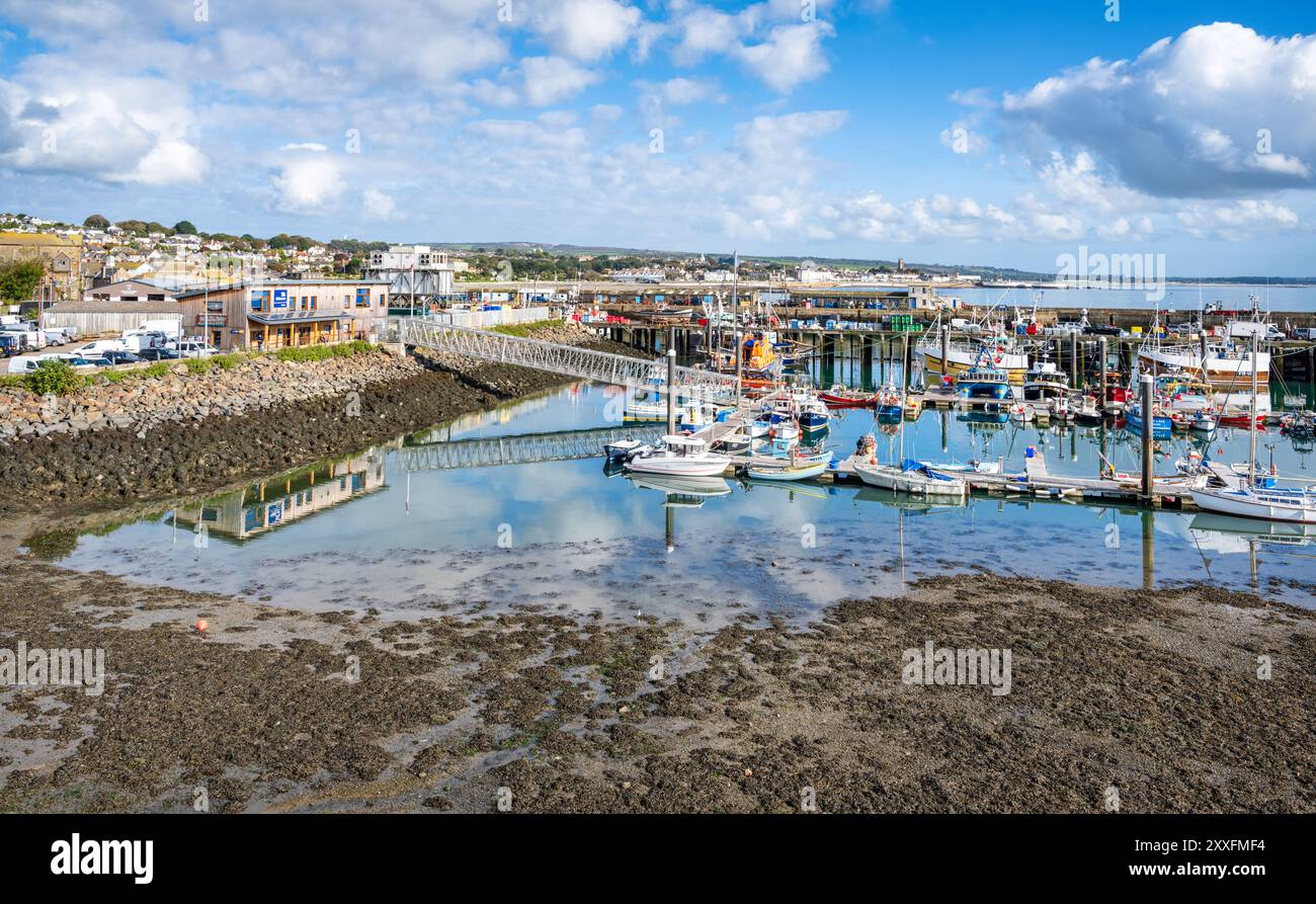 The busy fishing harbour at Newlyn, Cornwall, seen from the south side ...