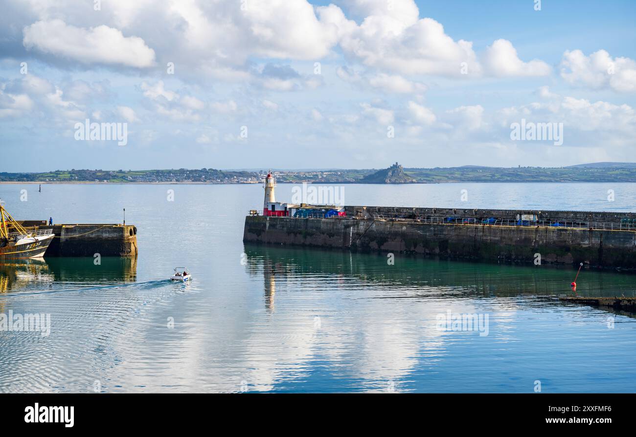 The harbour entrance at Newlyn, Cornwall, UK, with St Michael's Mount ...