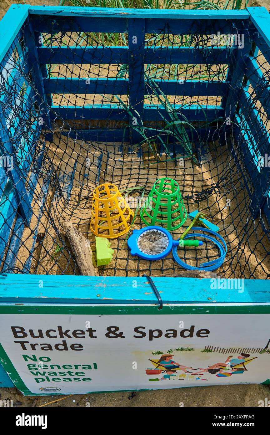 Container for discarded buckets and spades on St Annes beach Stock ...