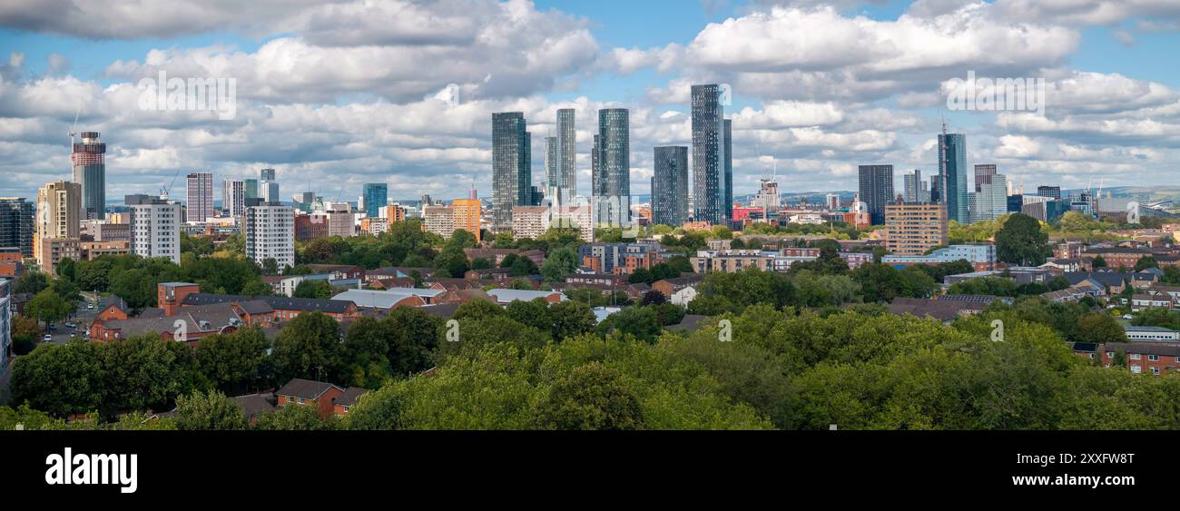 Panoramic view of Manchester, UK with tall buildings, including several ...