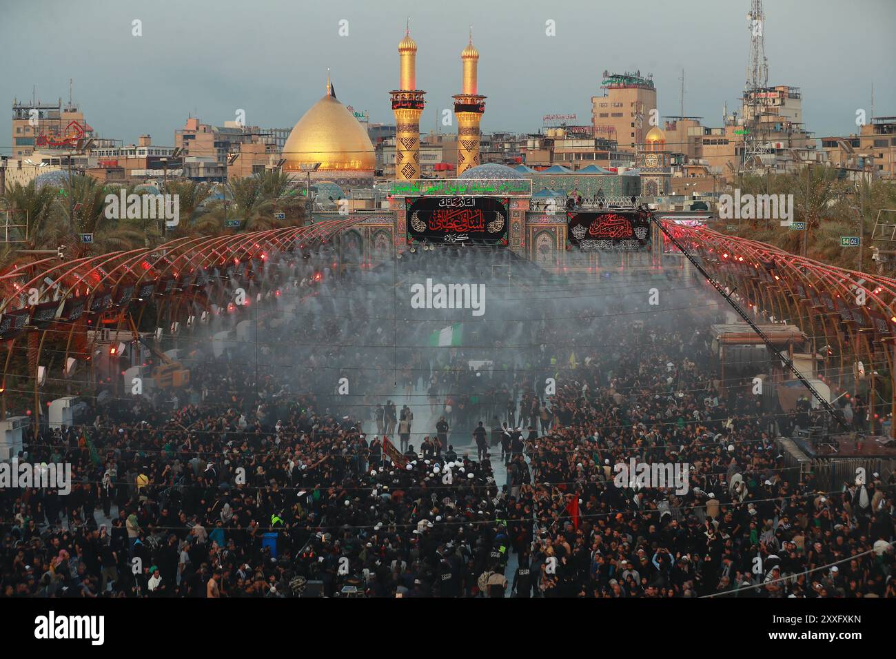 Karbala, Iraq. 24th Aug, 2024. Shiite Muslims take part in the mourning ...