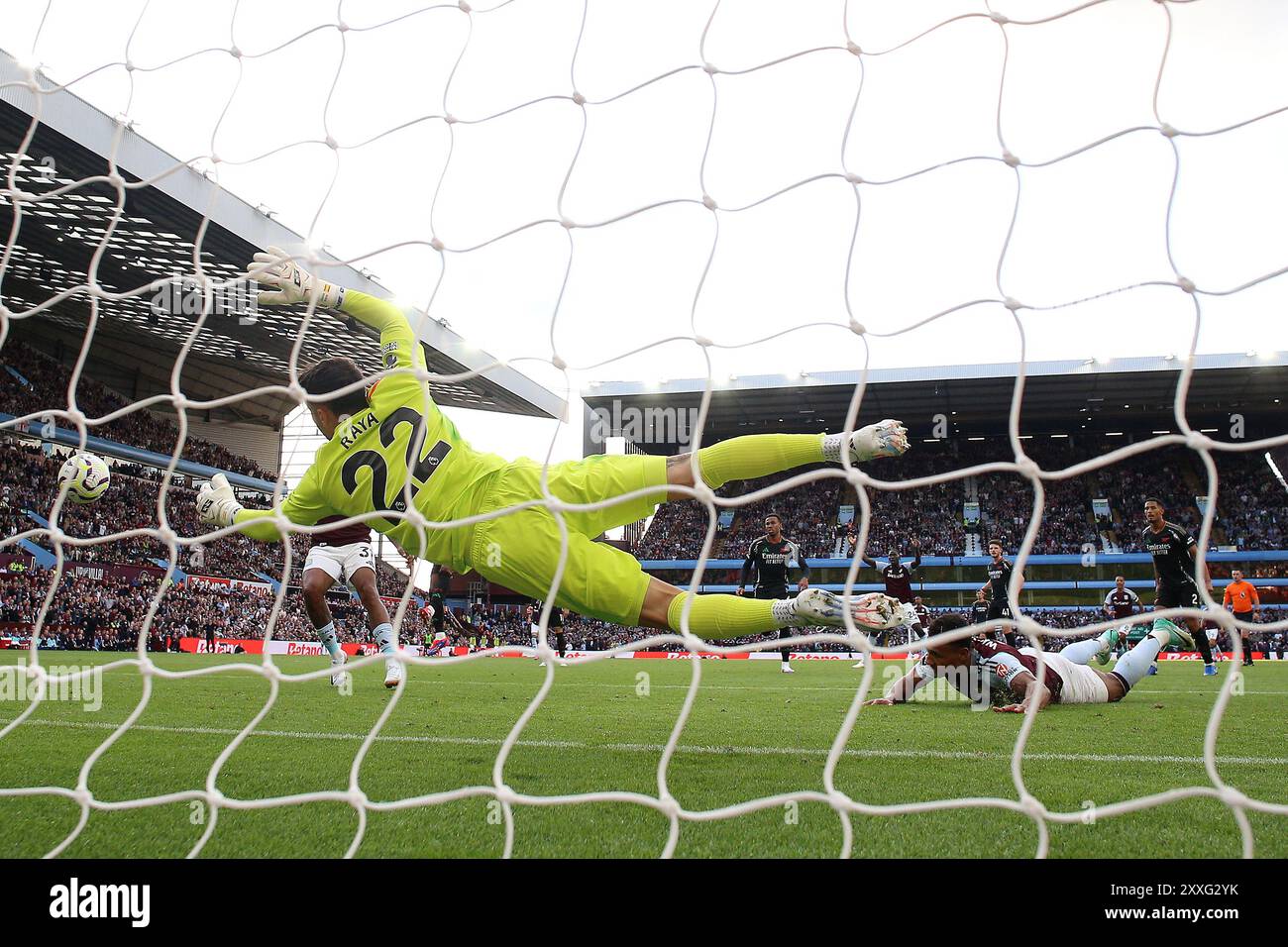 Arsenal goalkeeper David Raya saves a shot on goal from Aston Villa's ...