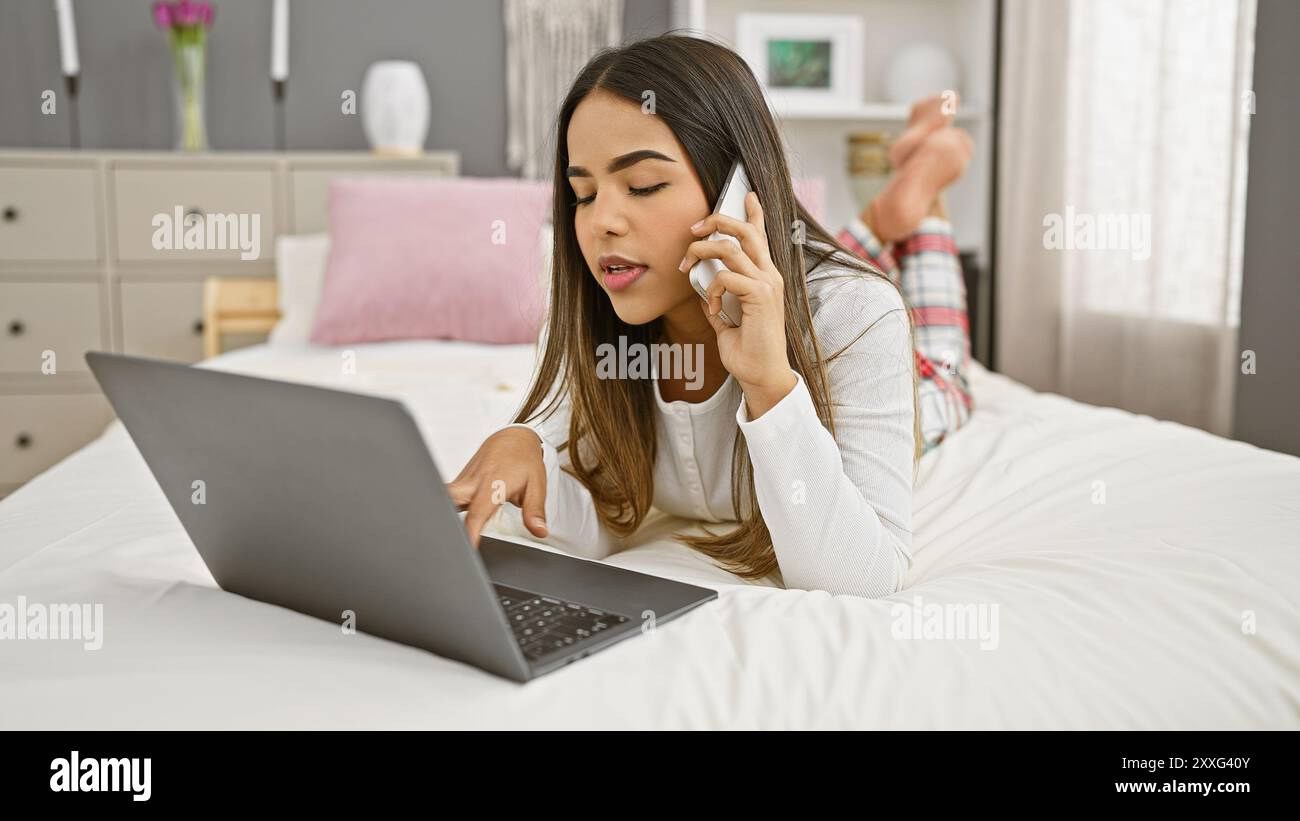 Woman multitasks in bedroom hi-res stock photography and images - Alamy