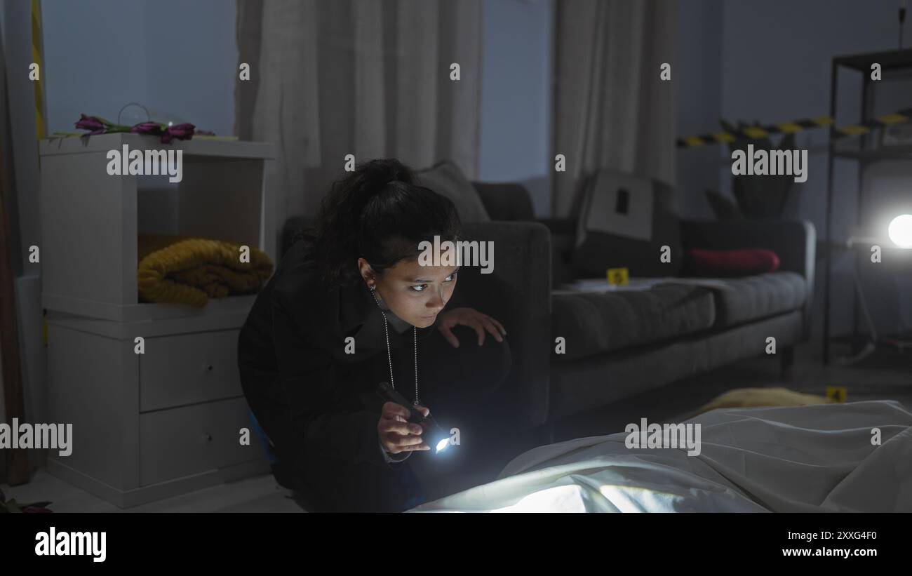 A young hispanic woman investigates a crime scene indoors, attentively ...