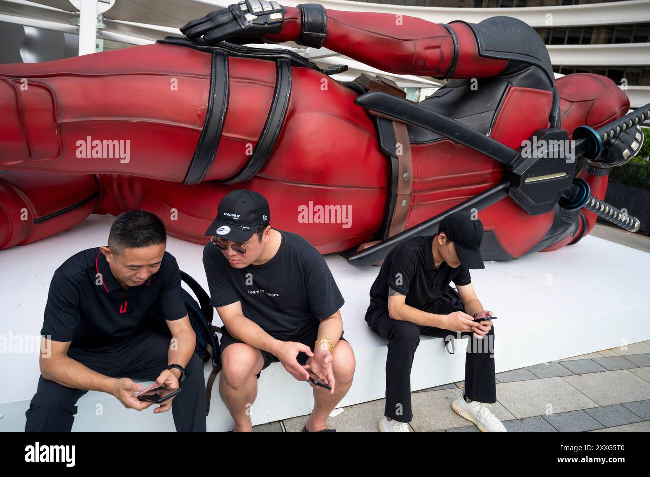 Hong Kong, China. 18th Aug, 2024. Locals and tourists pose for photos ...