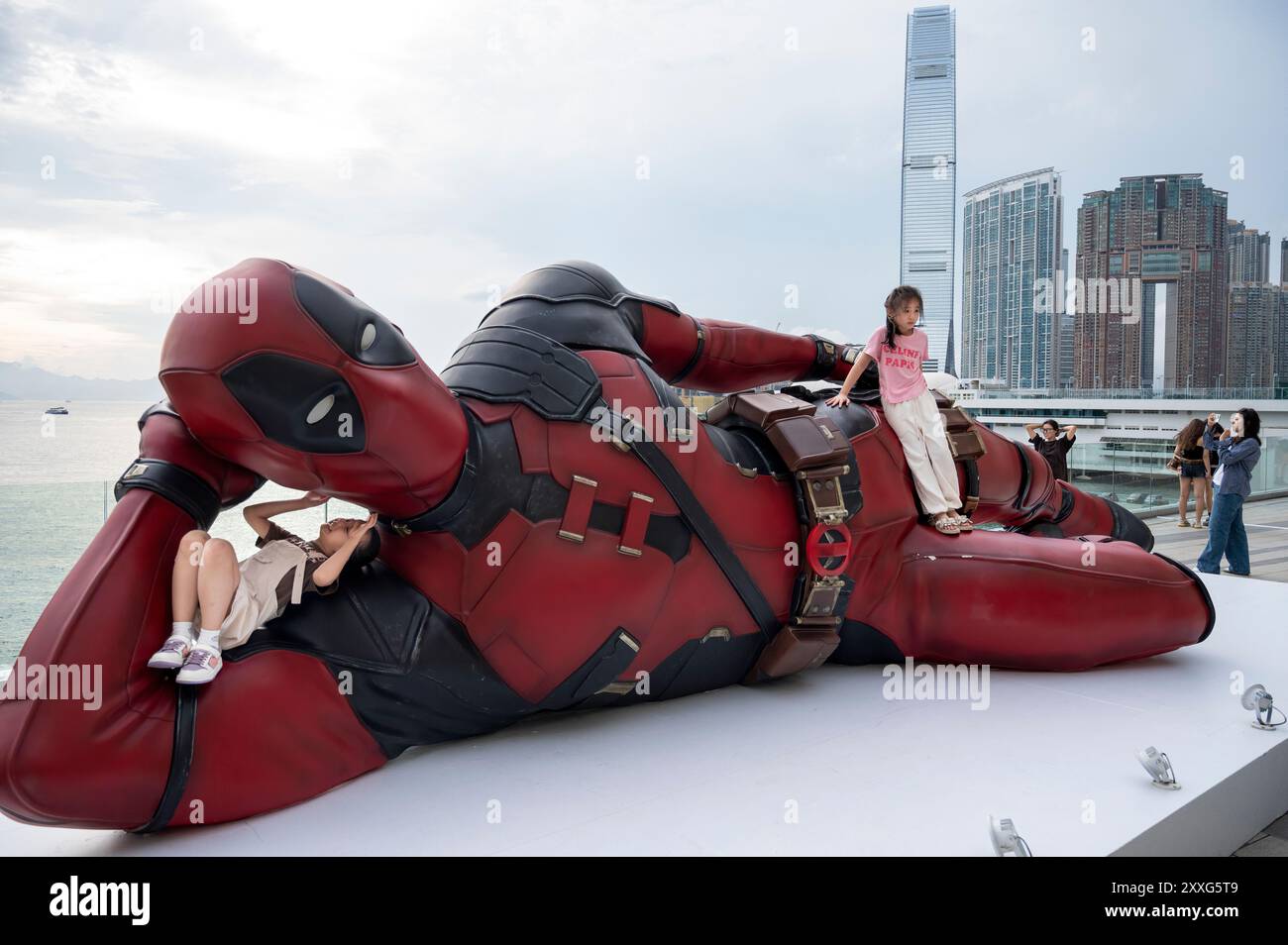 Hong Kong, China. 18th Aug, 2024. Children climb an 8-meter ...