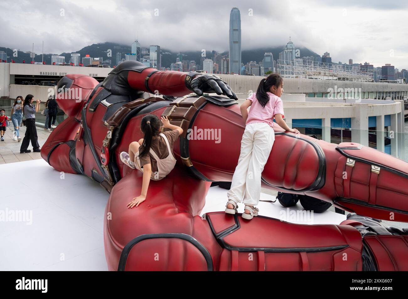 Hong Kong, China. 18th Aug, 2024. Children climb an 8-meter ...