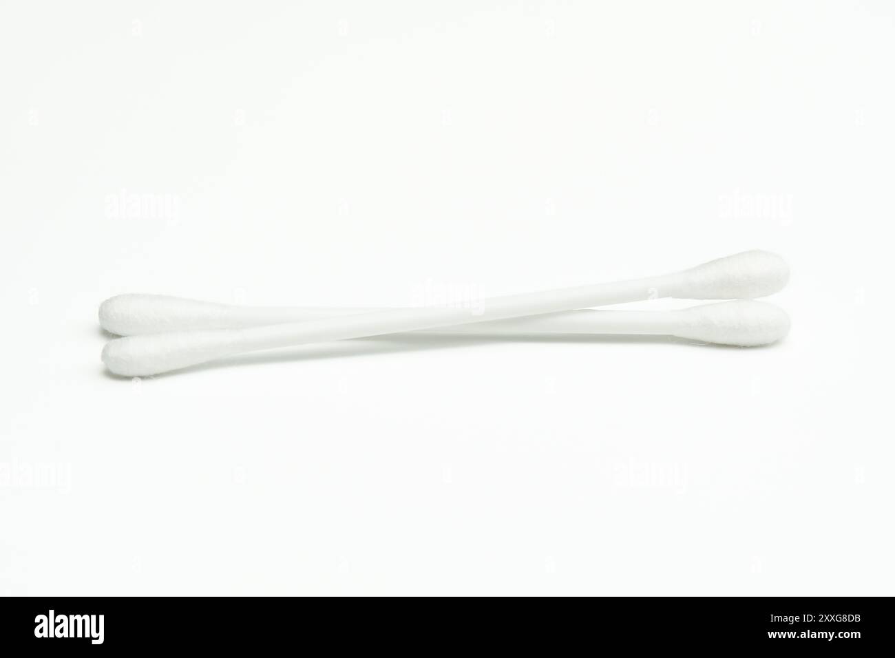 Plastic cotton swabs on white background Stock Photo - Alamy