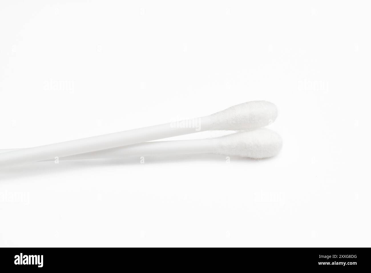 Plastic cotton swabs on white background Stock Photo - Alamy