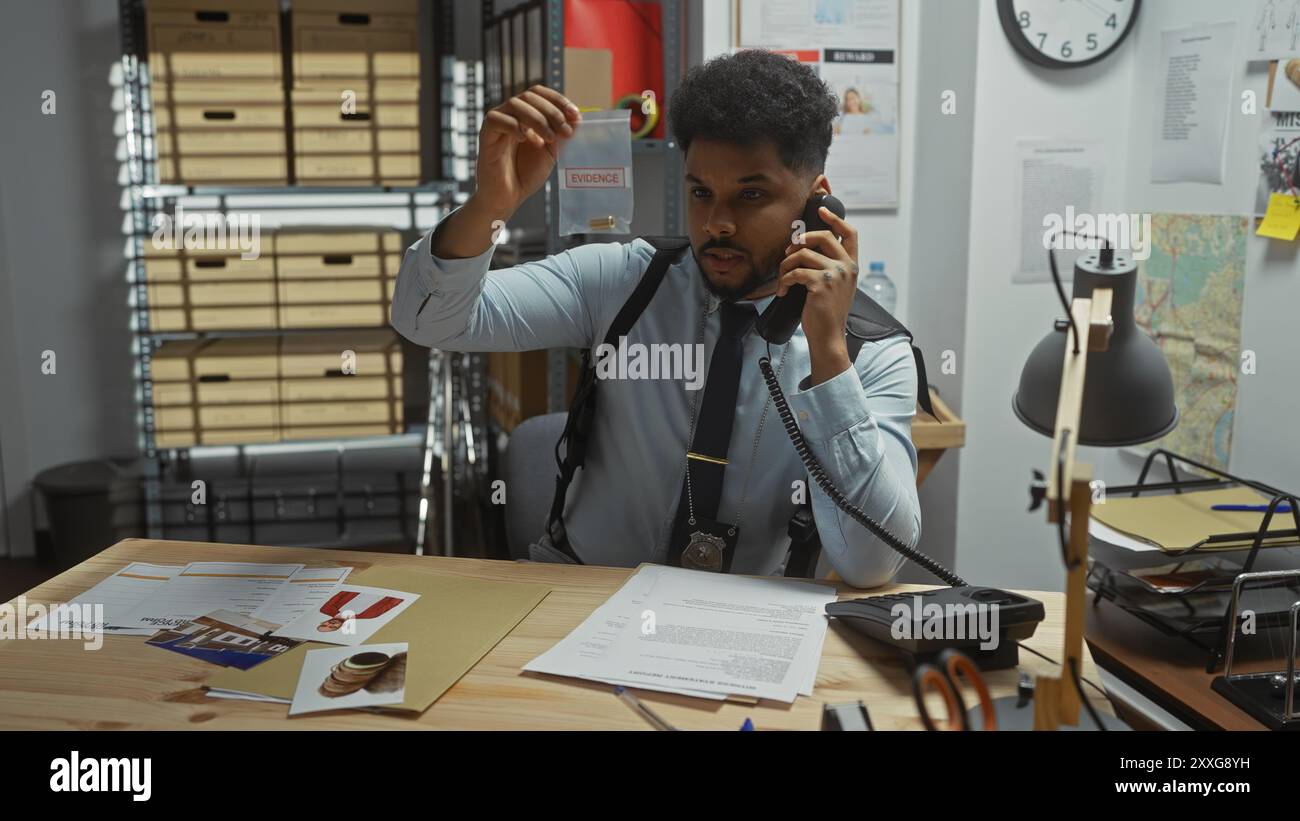 African american detective examining evidence while speaking on the ...