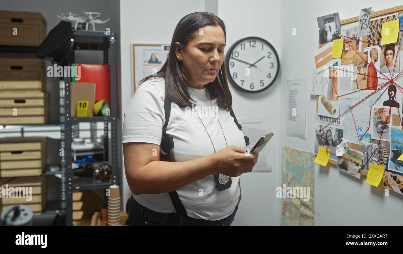 Hispanic woman detective analyzes evidence hi-res stock photography and ...