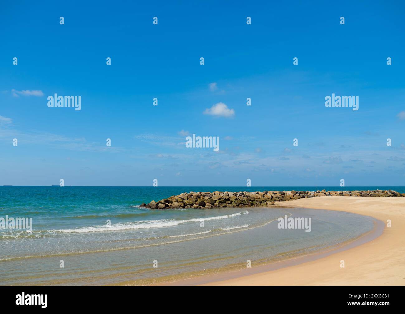 Small half moon bay and bended waves created by stone manmade ...