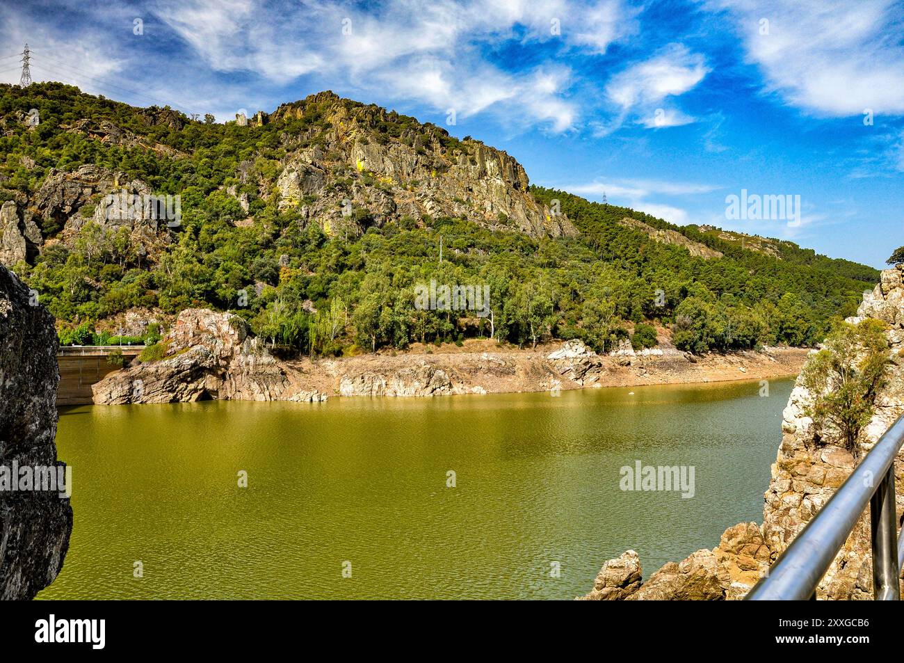 The García Sola Reservoir, created by damming the Guadiana river, is ...