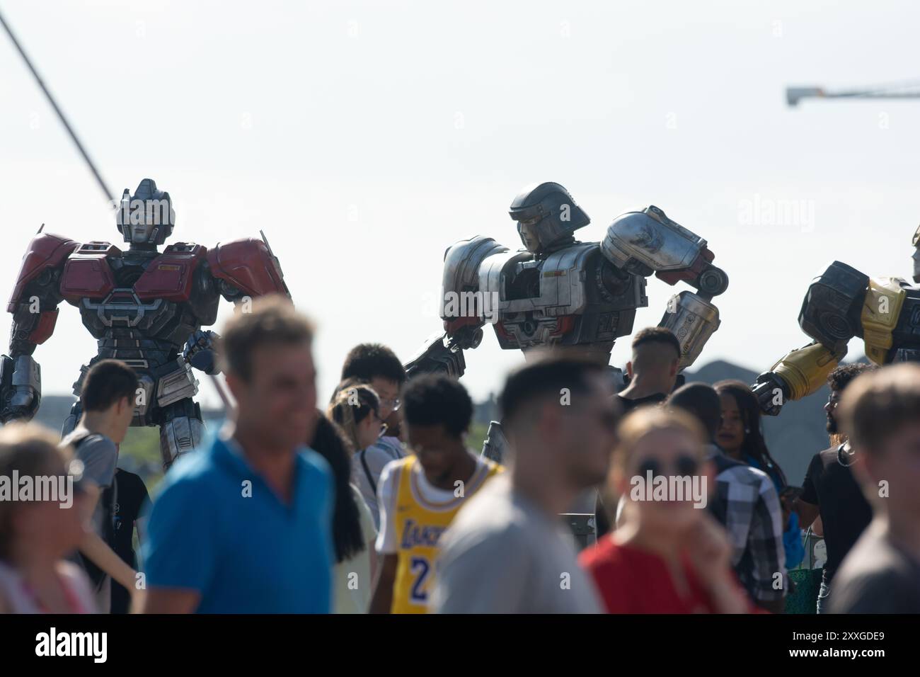 Cologne, Germany. 24th Aug, 2024. Tourists take pictures with the ...