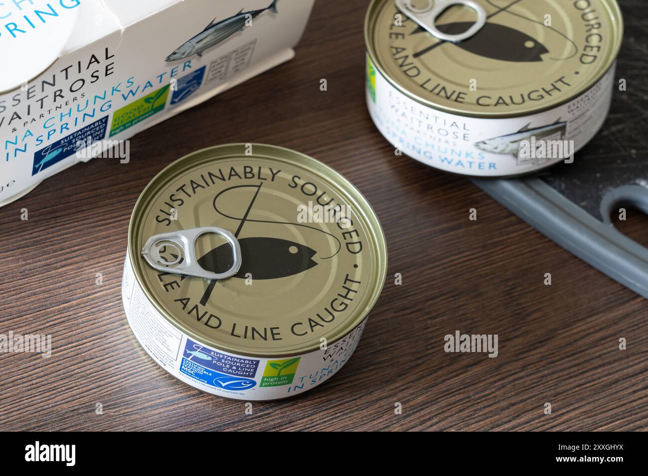 Tins of Waitrose supermarket tinned tuna fish with the caption that the ...