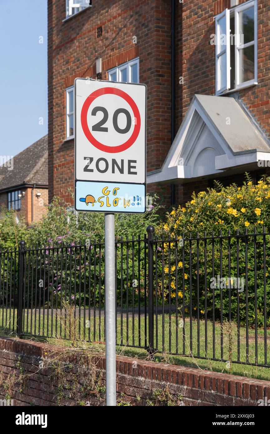Road sign showing a 20mph zone in Basingstoke, England. Concept ...