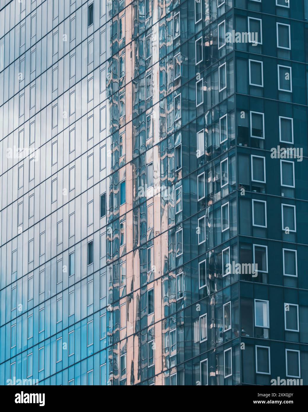 New York City building reflecting on the windows of another structure ...