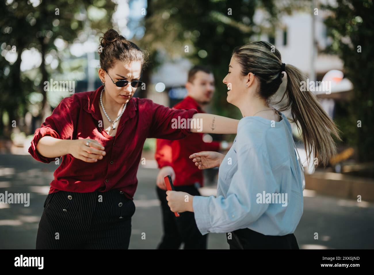 Businesspeople enjoying an outdoor break with lively conversation and ...