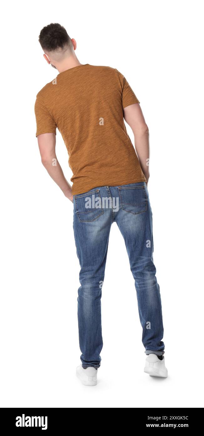 Man standing in queue on white background, back view Stock Photo - Alamy