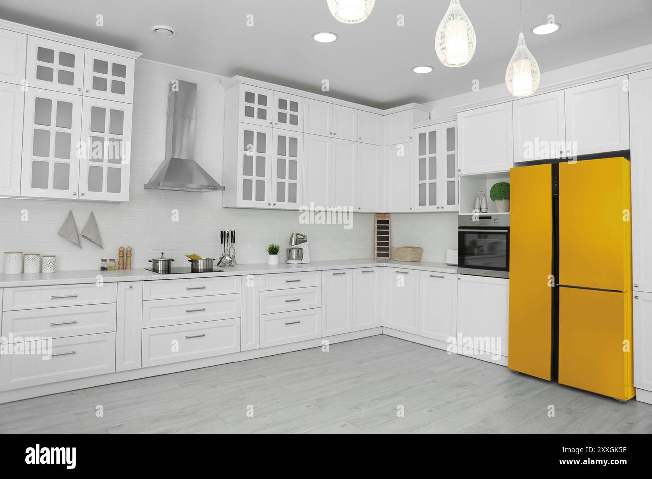 Yellow refrigerator in kitchen. Bright color accent in interior Stock ...