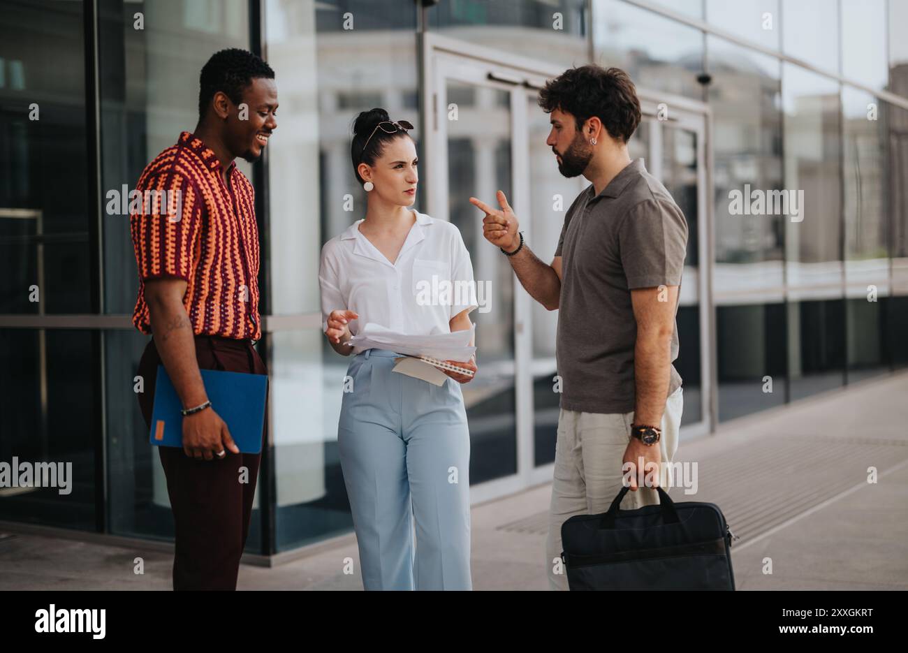 Business people collaborating in an urban city environment Stock Photo ...