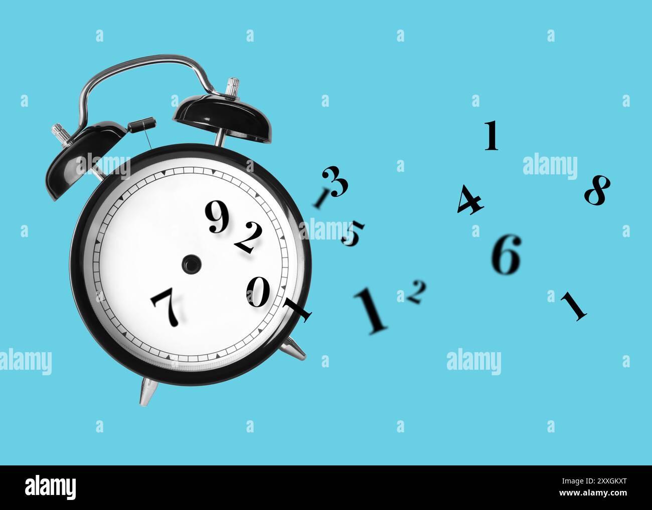 Numbers flying away from alarm clock on light blue background. Time ...