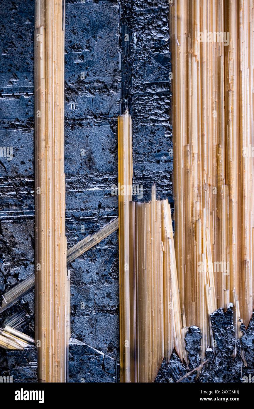 Yellow rutile on hematite. Specimen from Ibitiara city, Bahia, Brazil ...
