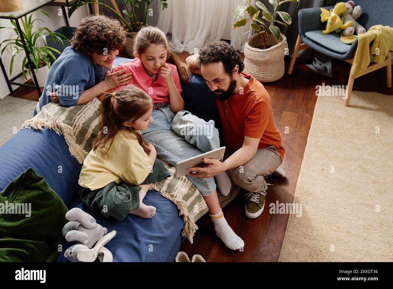 Parents children portrait family play hi-res stock photography and ...