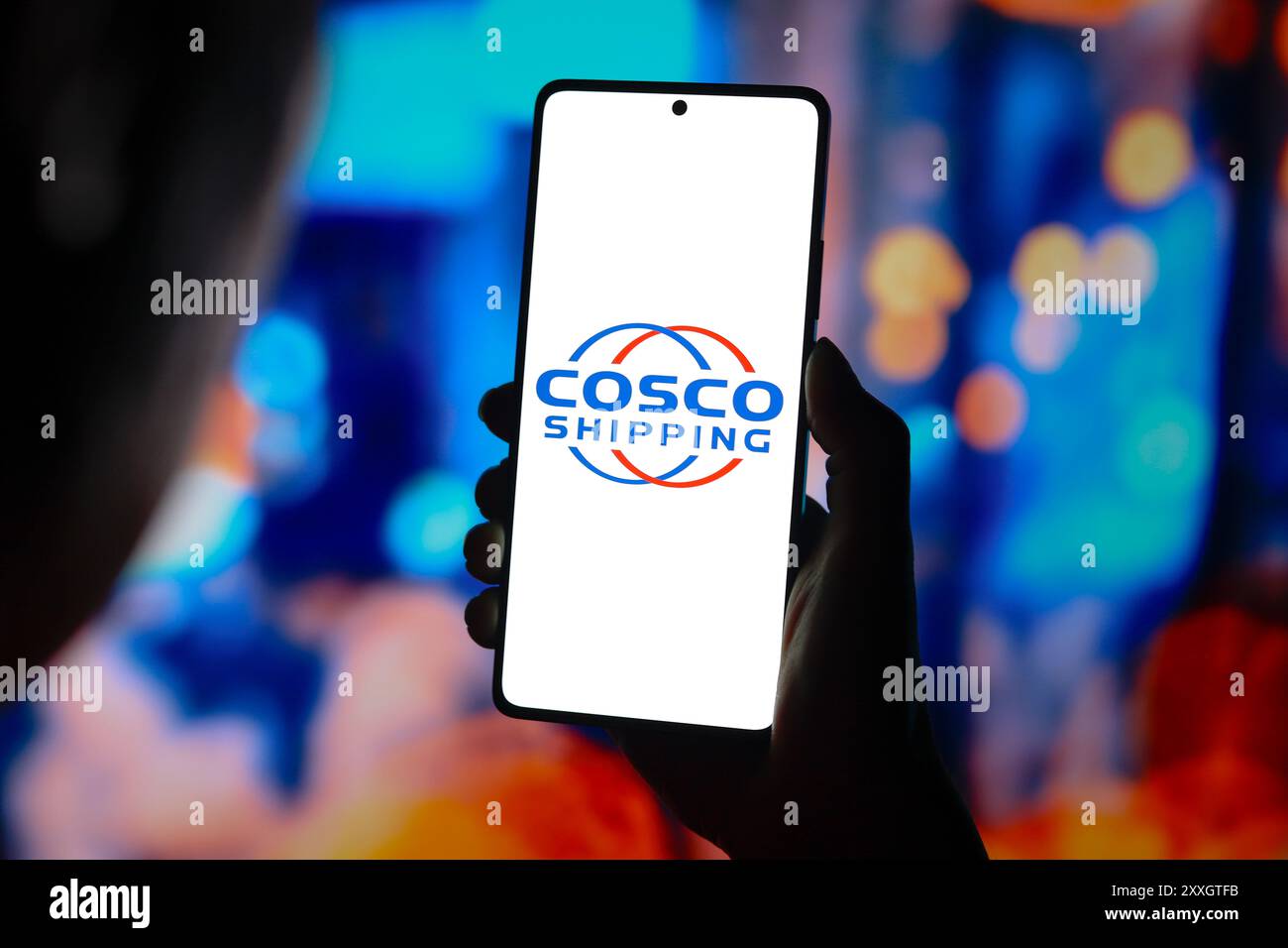 In this photo illustration, the COSCO Shipping logo is displayed on a ...