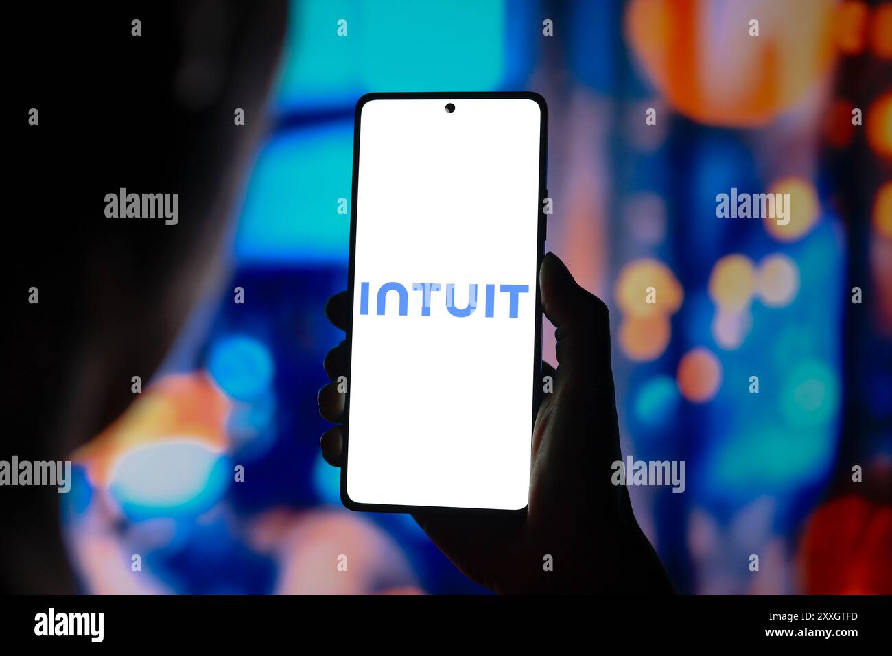 In this photo illustration, the Intuit Inc. logo is displayed on a ...
