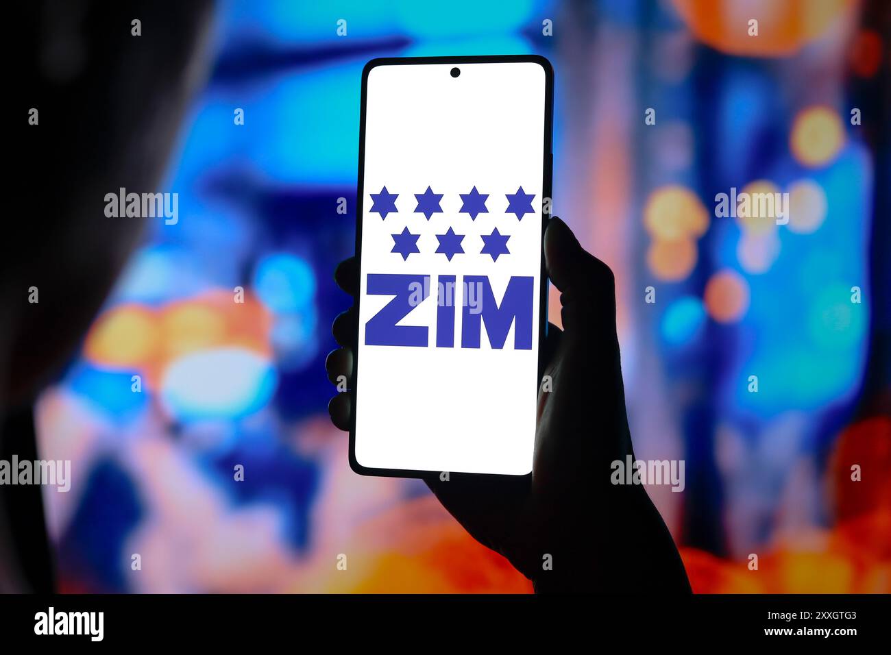 In this photo illustration, the Zim Integrated Shipping Services (ZIM ...