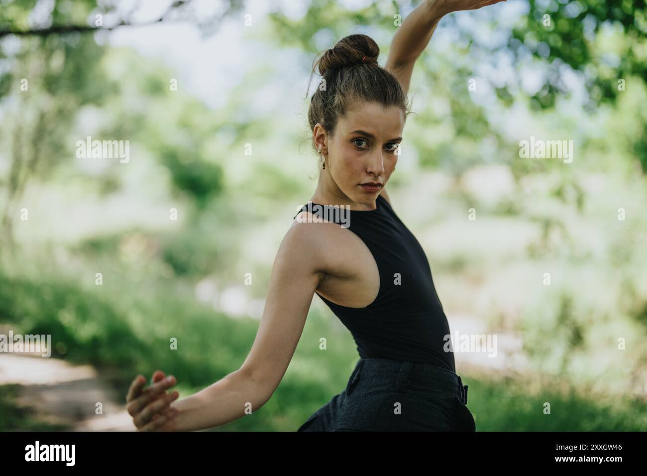 Lovely girl dancing in nature, female dancer performing modern dance Stock Photo - Alamy