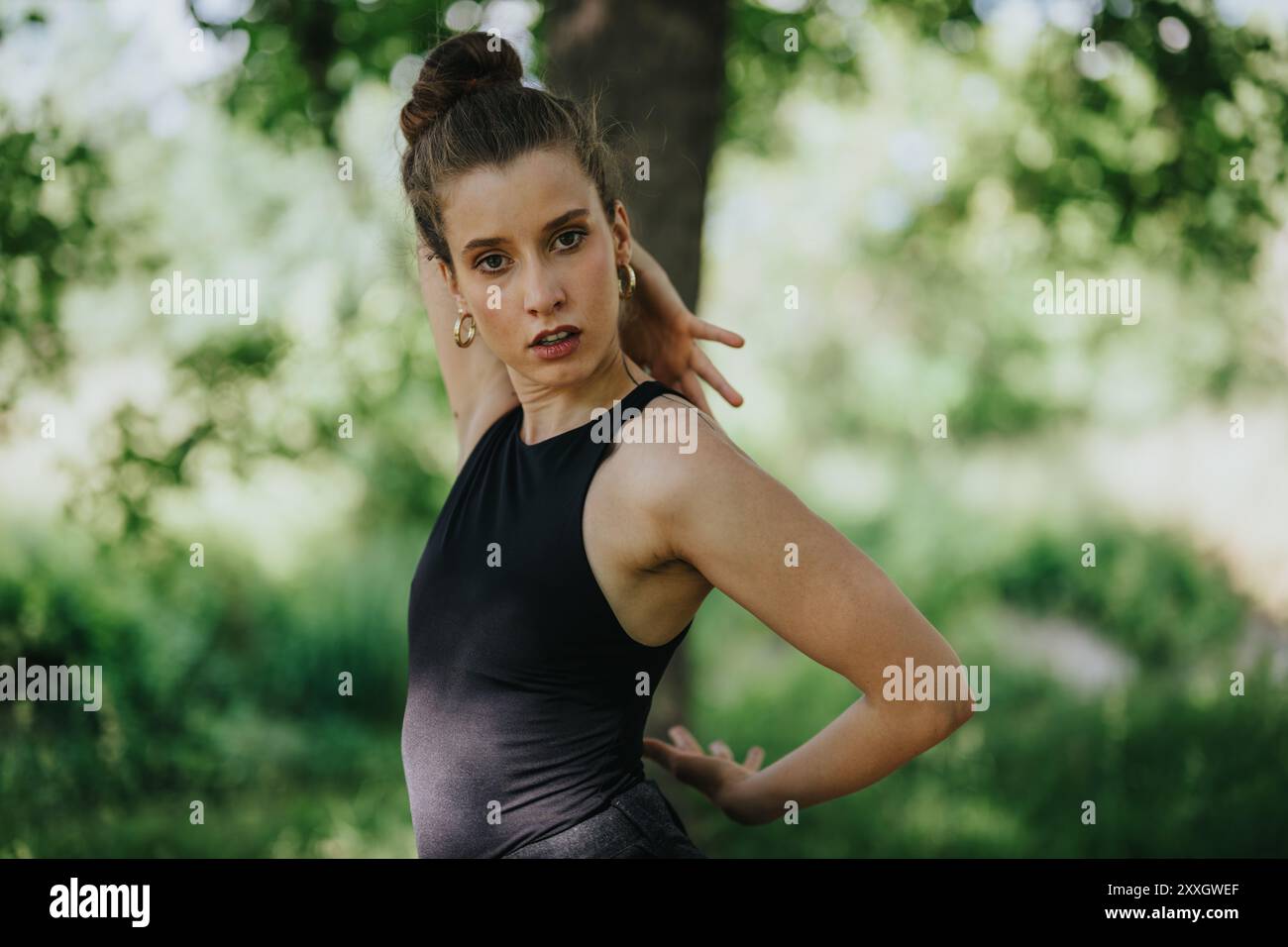 Lovely girl dancing in nature, female dancer performing modern dance in nature Stock Photo - Alamy