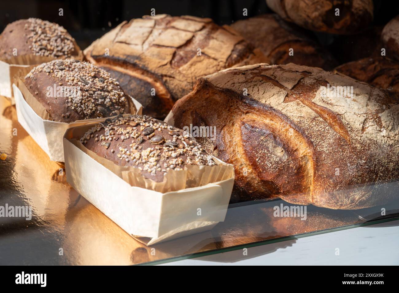 French artisan bakery in Bordeaux, fresh baked rye and wheat bread and ...