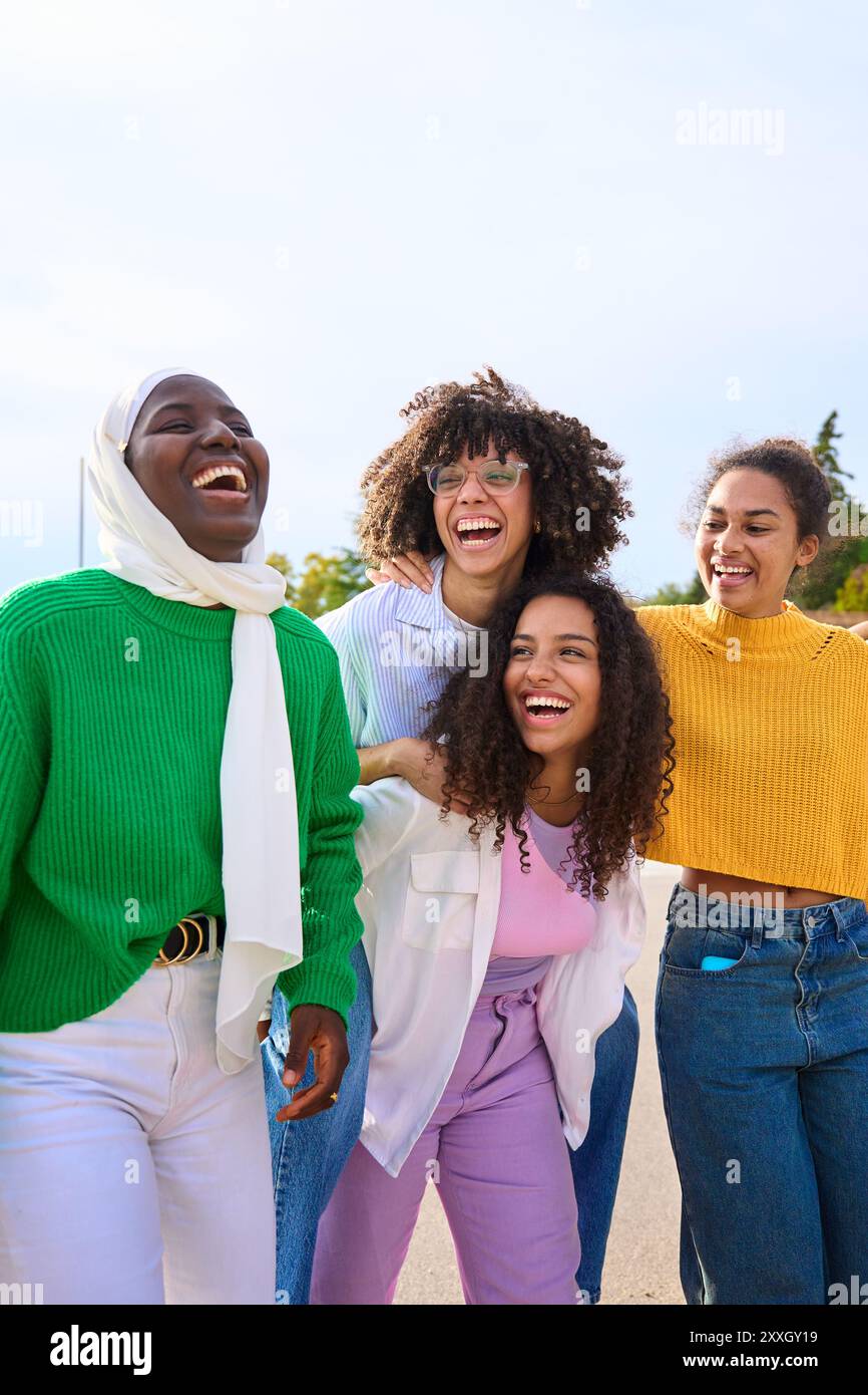 Group of diverse generation z only friends women walking piggyback ...