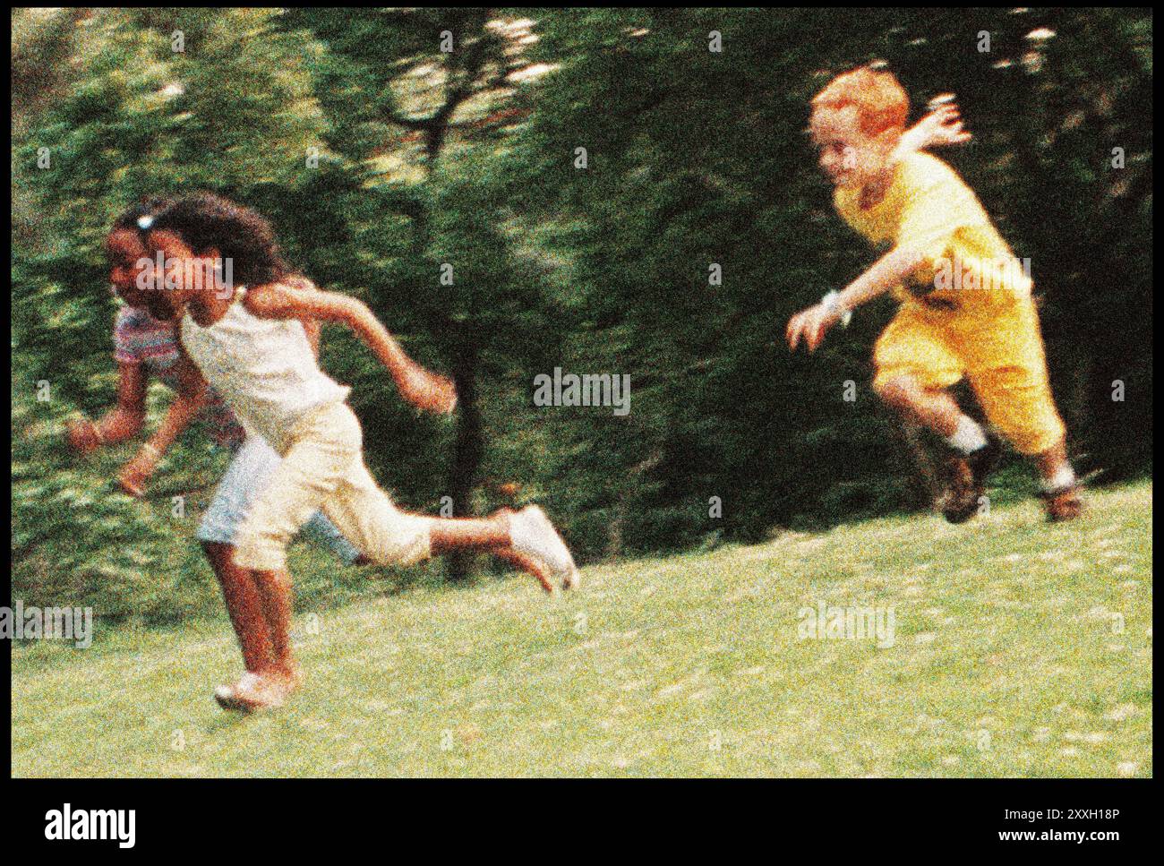 Kids running around in Central Park Stock Photo - Alamy
