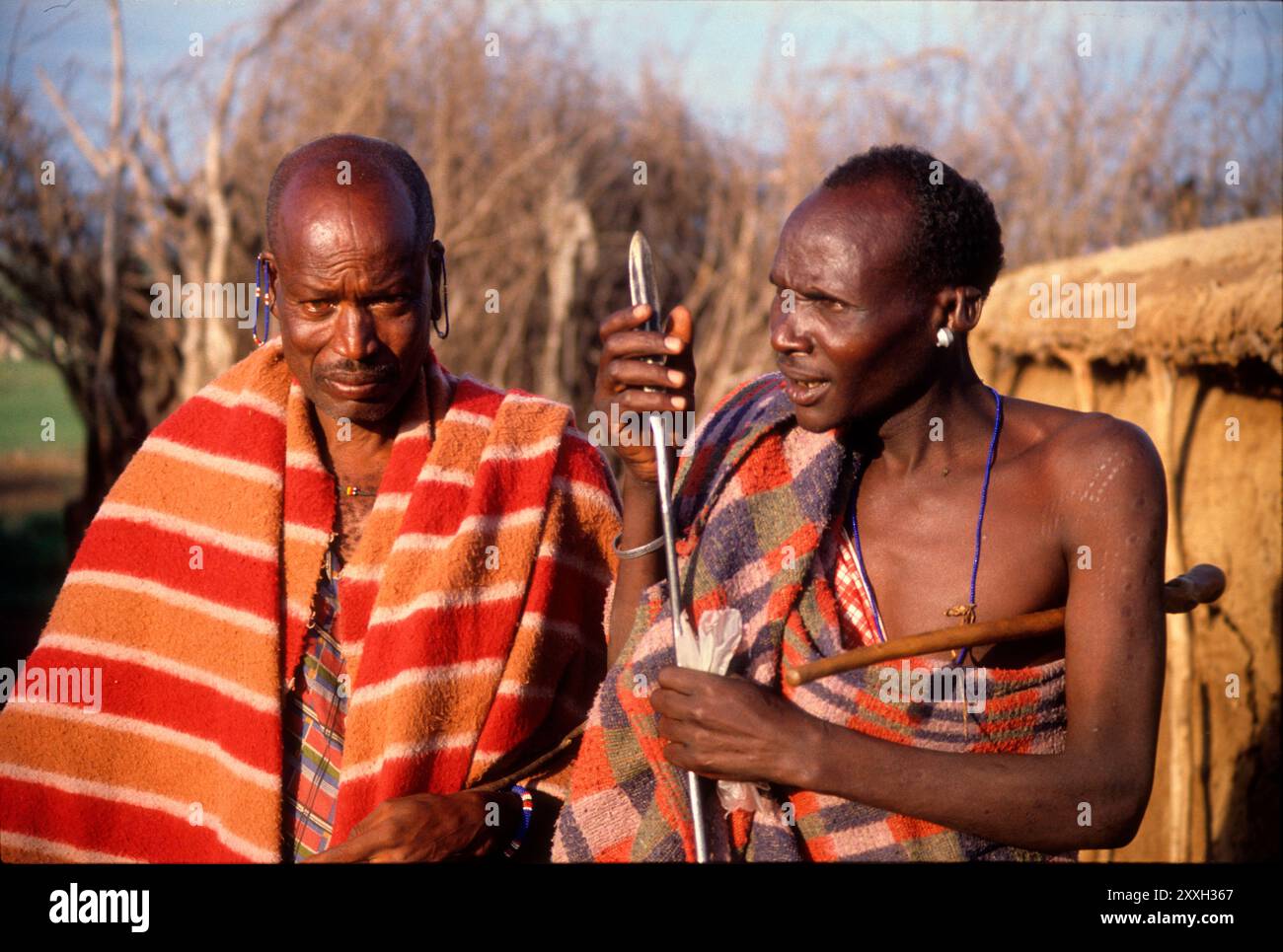 Masai warriors at an Manyatta near Sekenani Gate, Masai Mara Game ...