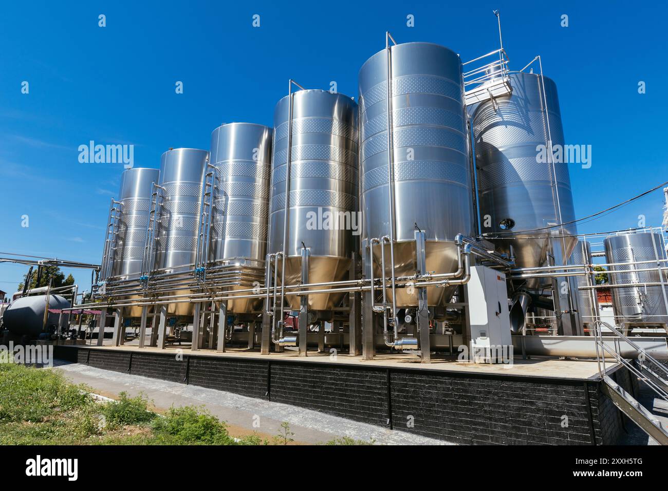 Modern winery production line. Large tanks for fermentation Stock Photo ...