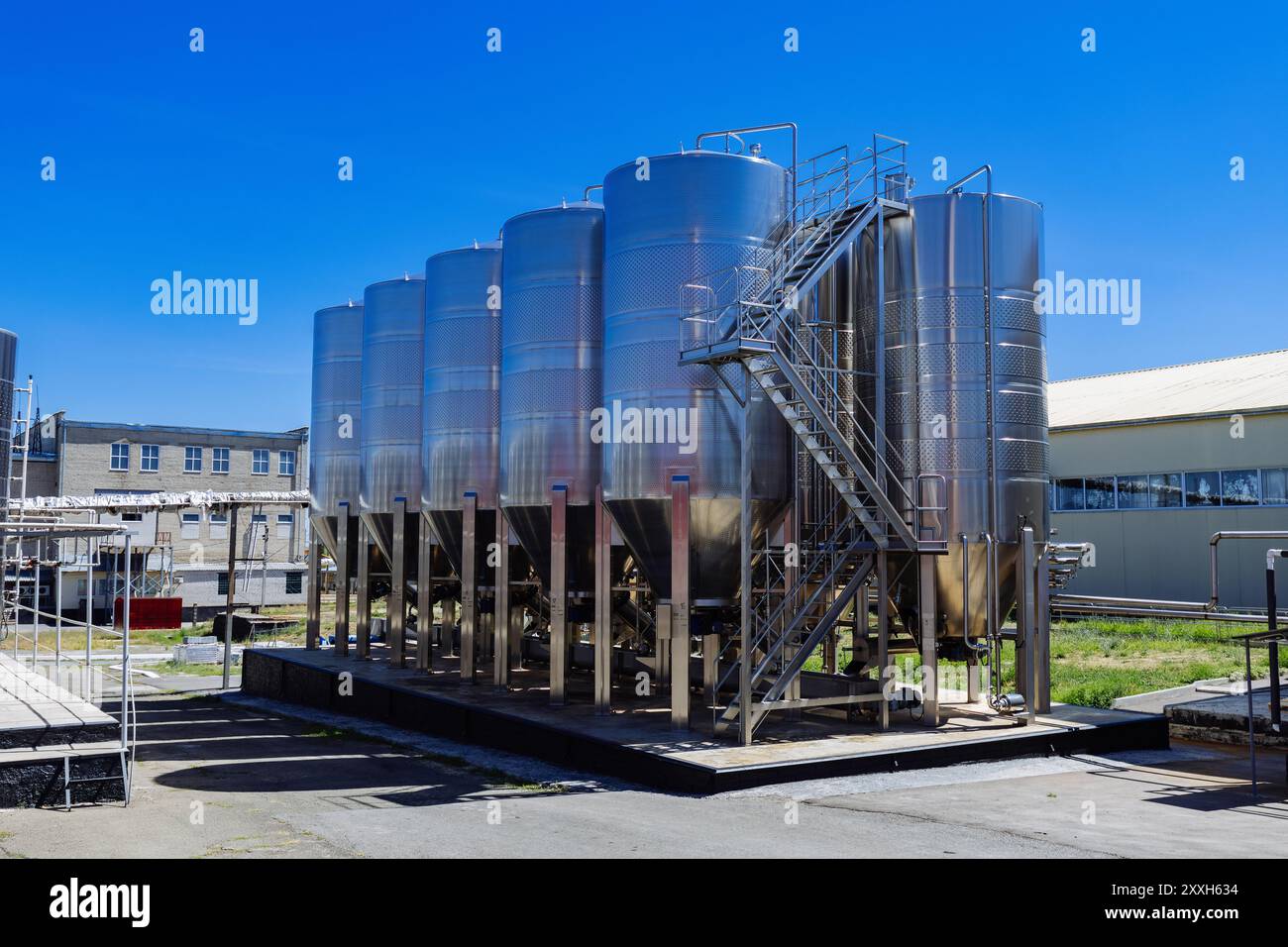 Modern winery production line. Large tanks for fermentation Stock Photo ...