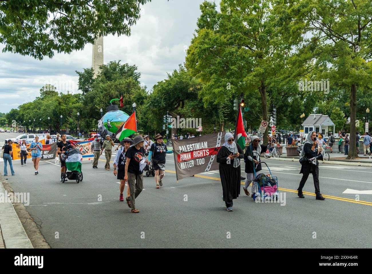 Washington DC, USA - 08/19/2024: A group of people are marching down ...