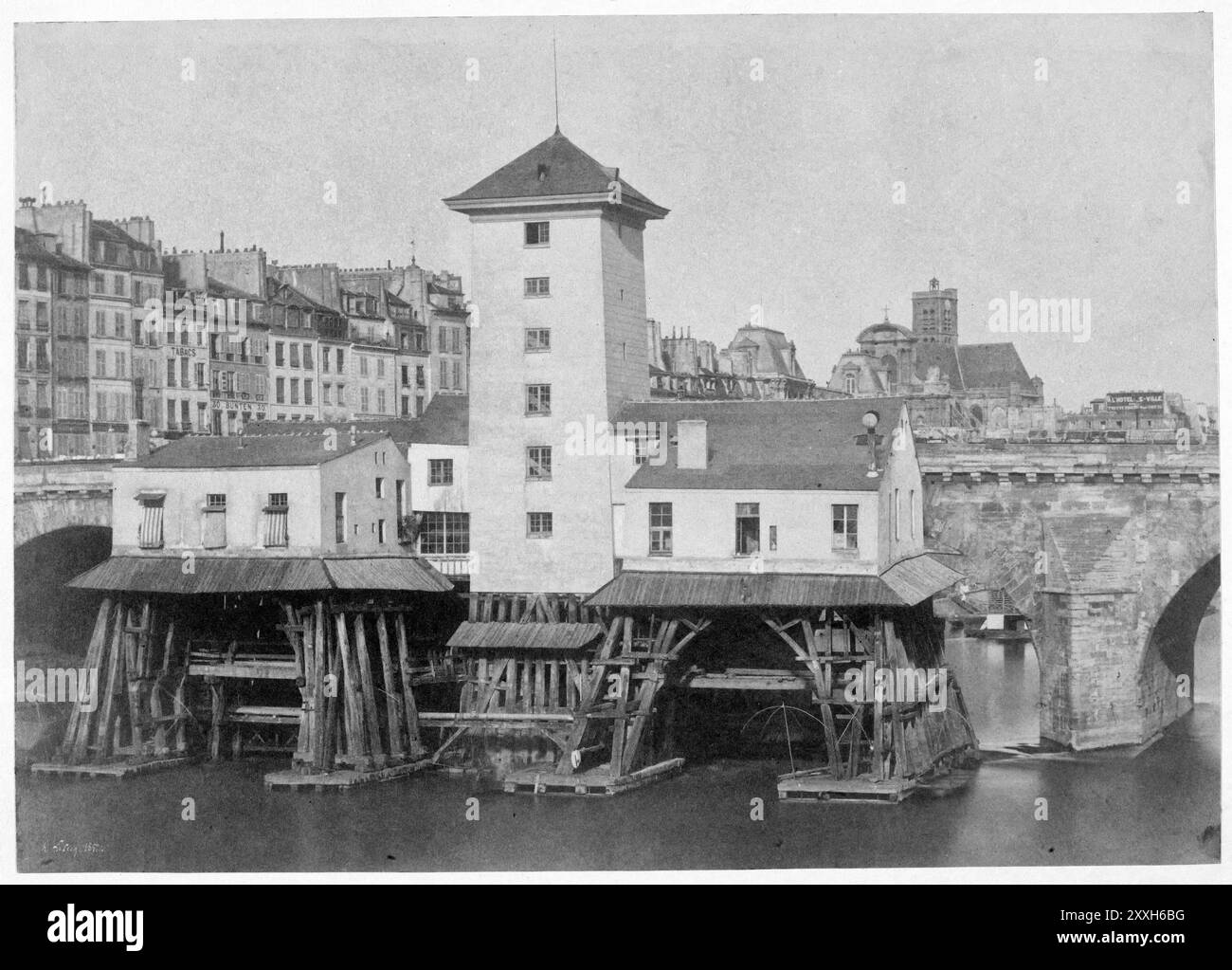 The Notre-Dame Pump house on the River Seine Paris France in 1852 ...