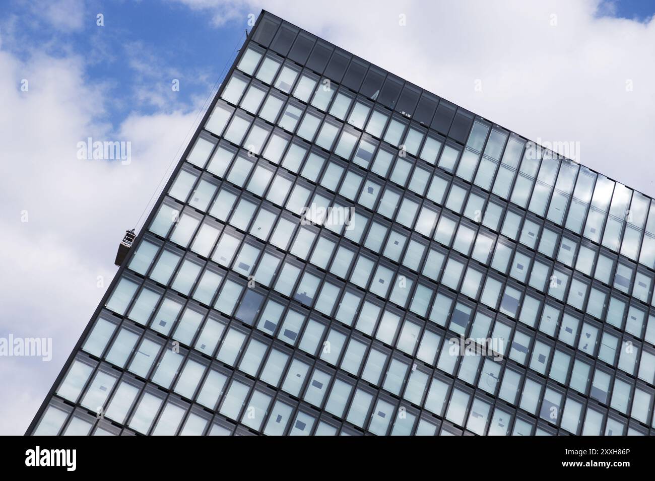 High-rise building with lift from the frog's perspective Stock Photo ...