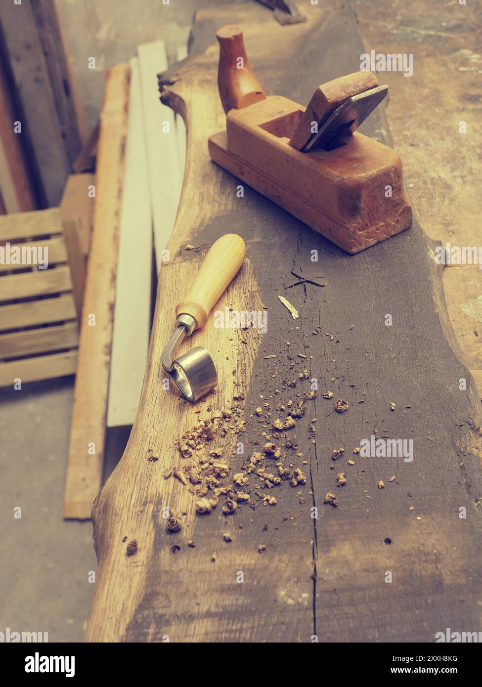 Wood worker tools on an old workbench in a carpentry Stock Photo - Alamy