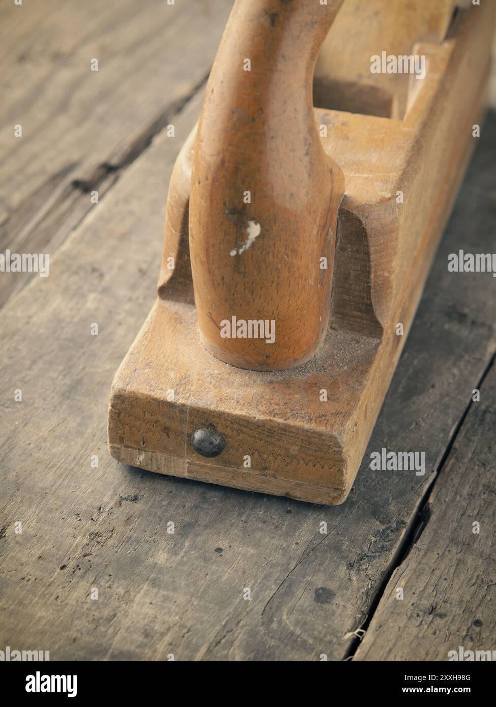 Old used wood plane on a rustic workbench, vintage color style Stock ...