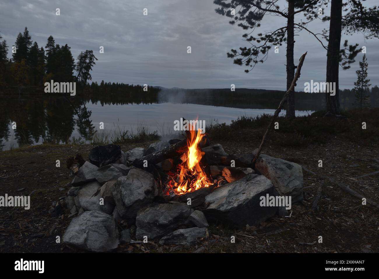 Campfire on an evening in sweden. Campfire in Sweden Stock Photo - Alamy